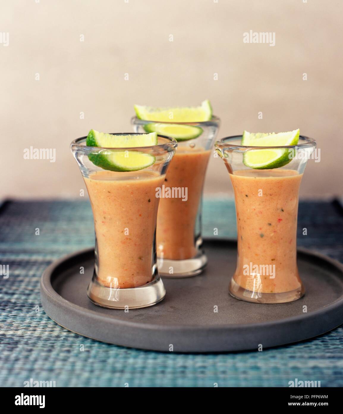Caldo de Sururu, Brazilian spicy mussel soup served in three glasses ...