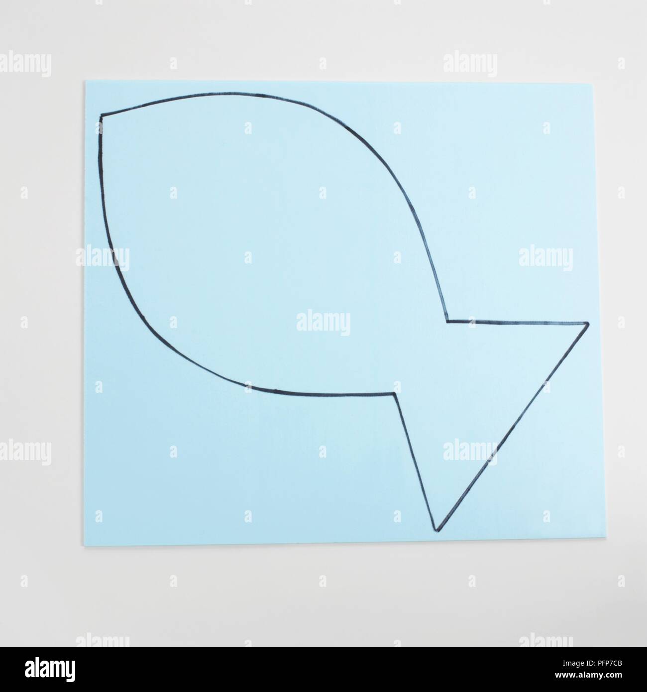 Outline of a fish on blue styrofoam Stock Photo - Alamy