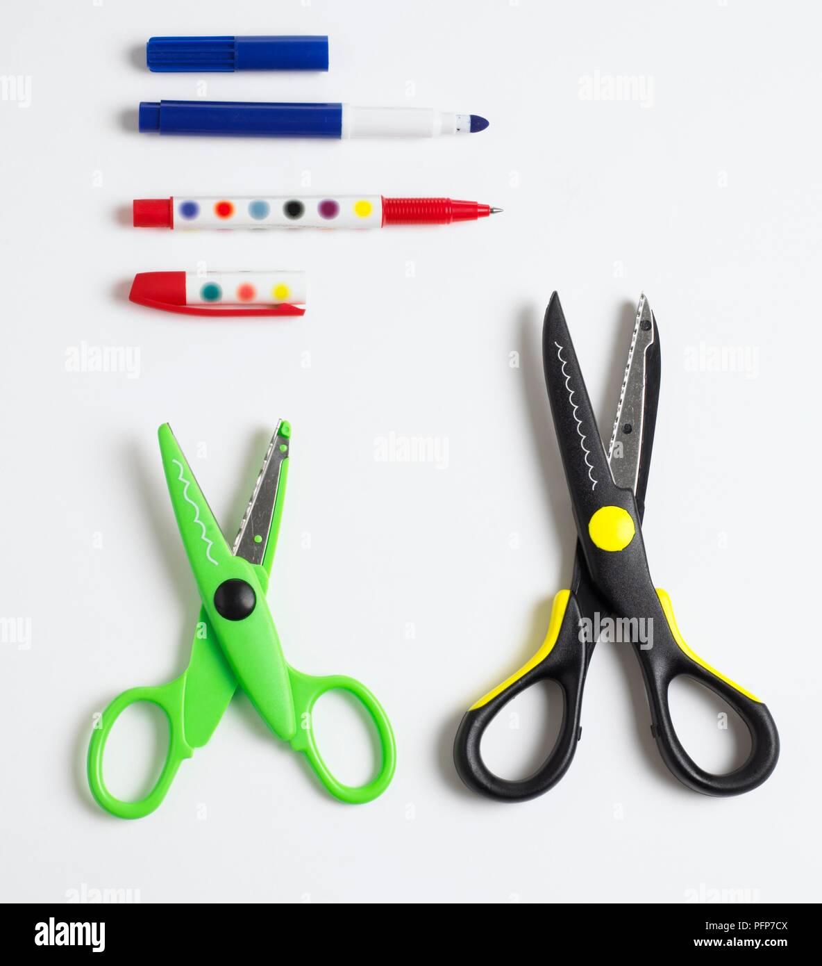 Craft scissors and pens Stock Photo - Alamy