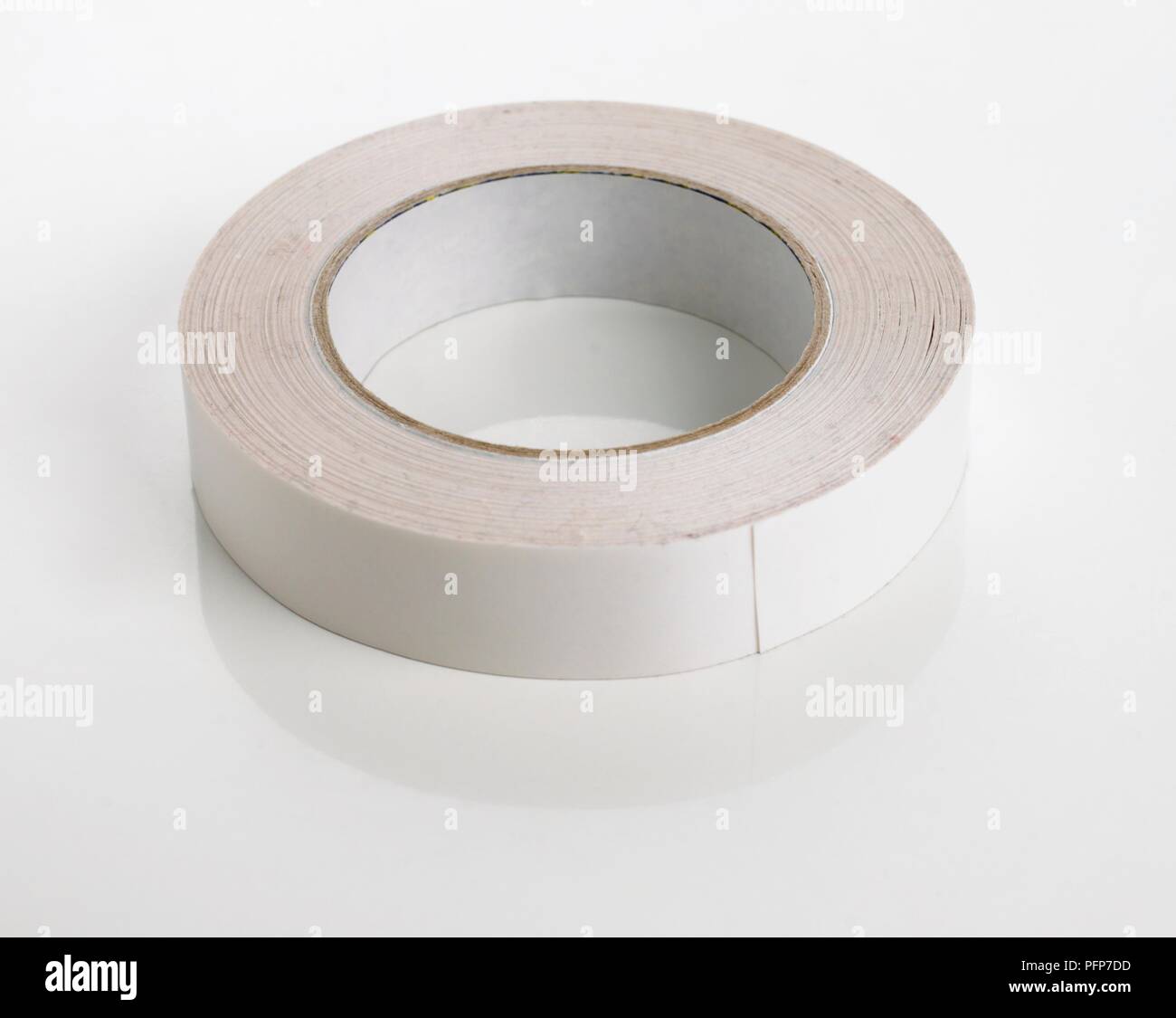Roll of white sticky tape Stock Photo - Alamy