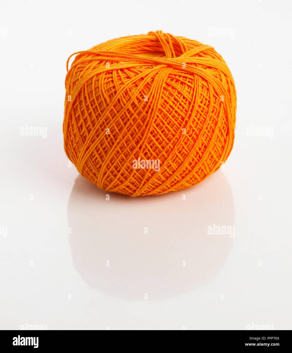 Ball of orange string Stock Photo - Alamy