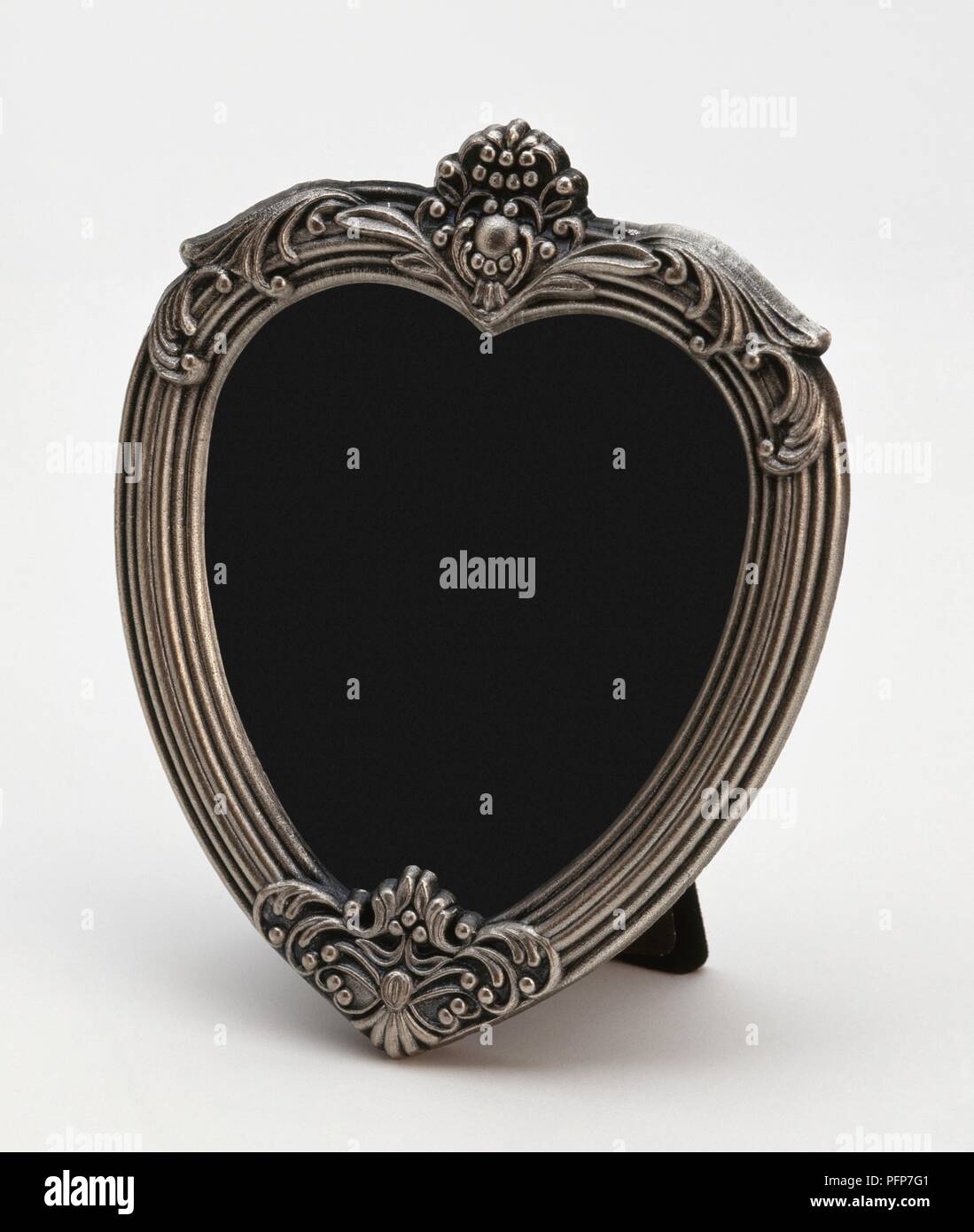Heart shape silver picture frame Stock Photo - Alamy