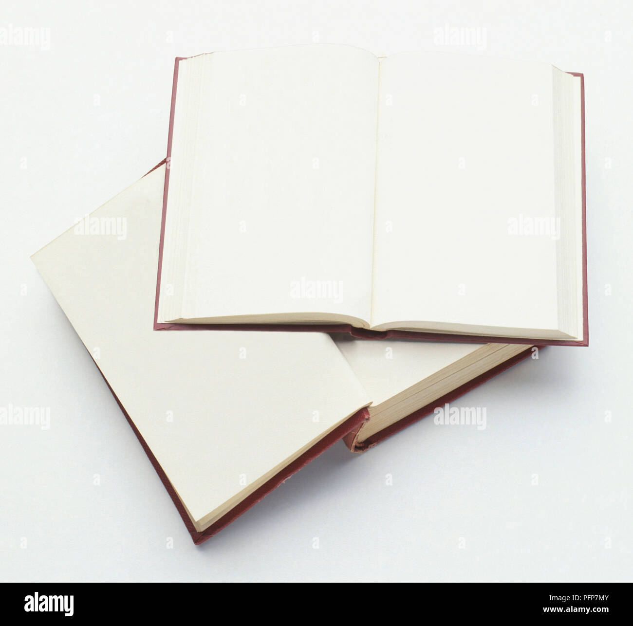 Two hardback books with blank pages Stock Photo - Alamy