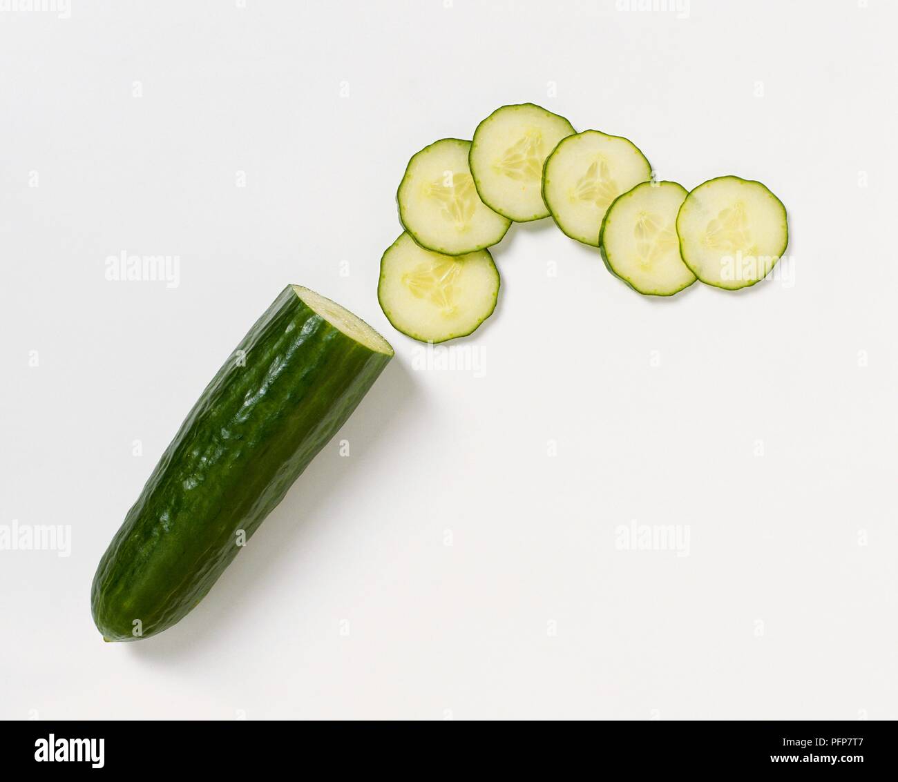 Cucumber and slices Stock Photo - Alamy