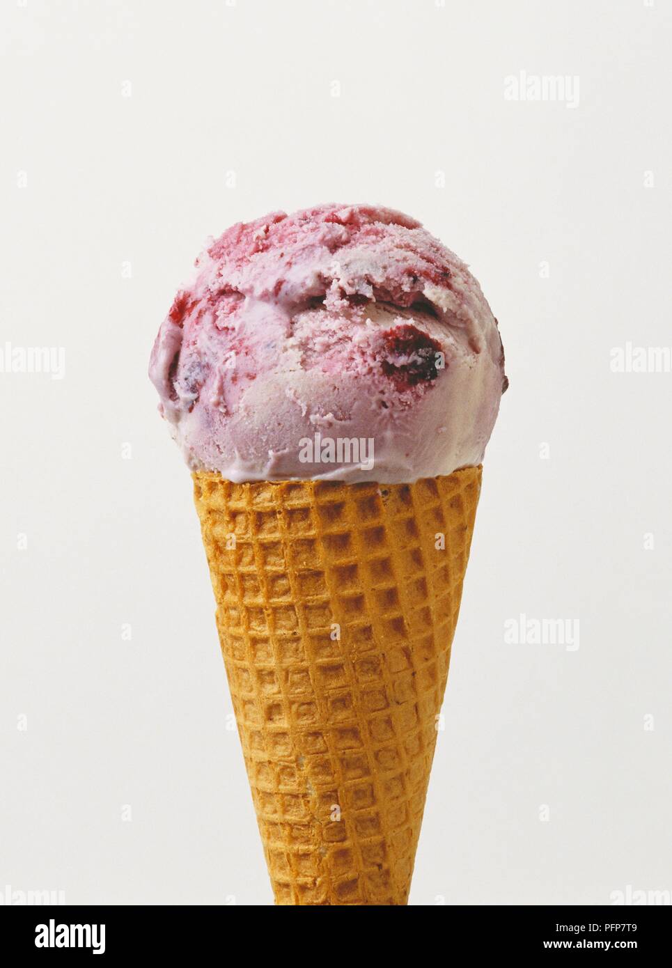 Raspberry ice cream cone Stock Photo - Alamy