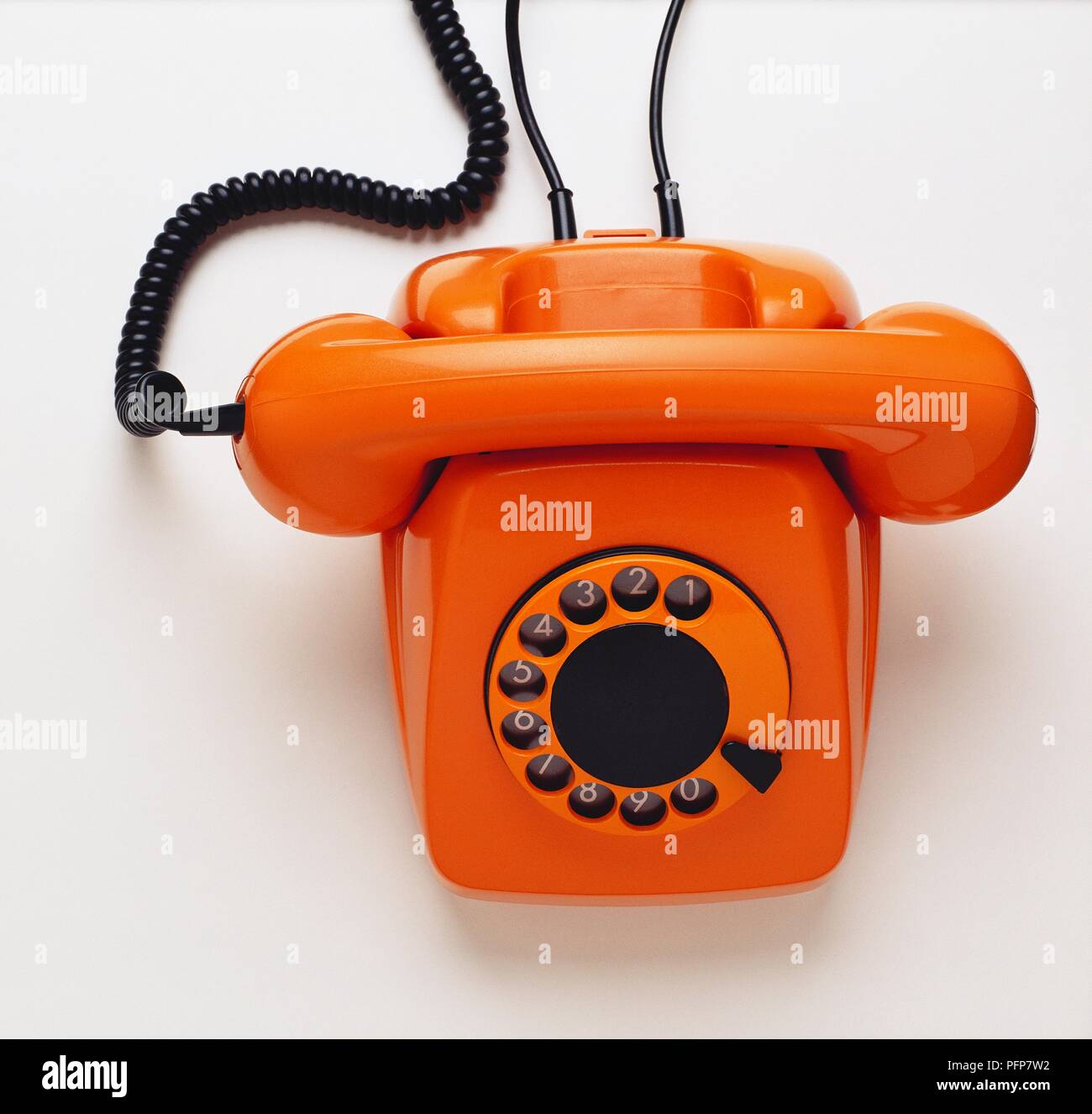 Orange plastic toy telephone Stock Photo - Alamy