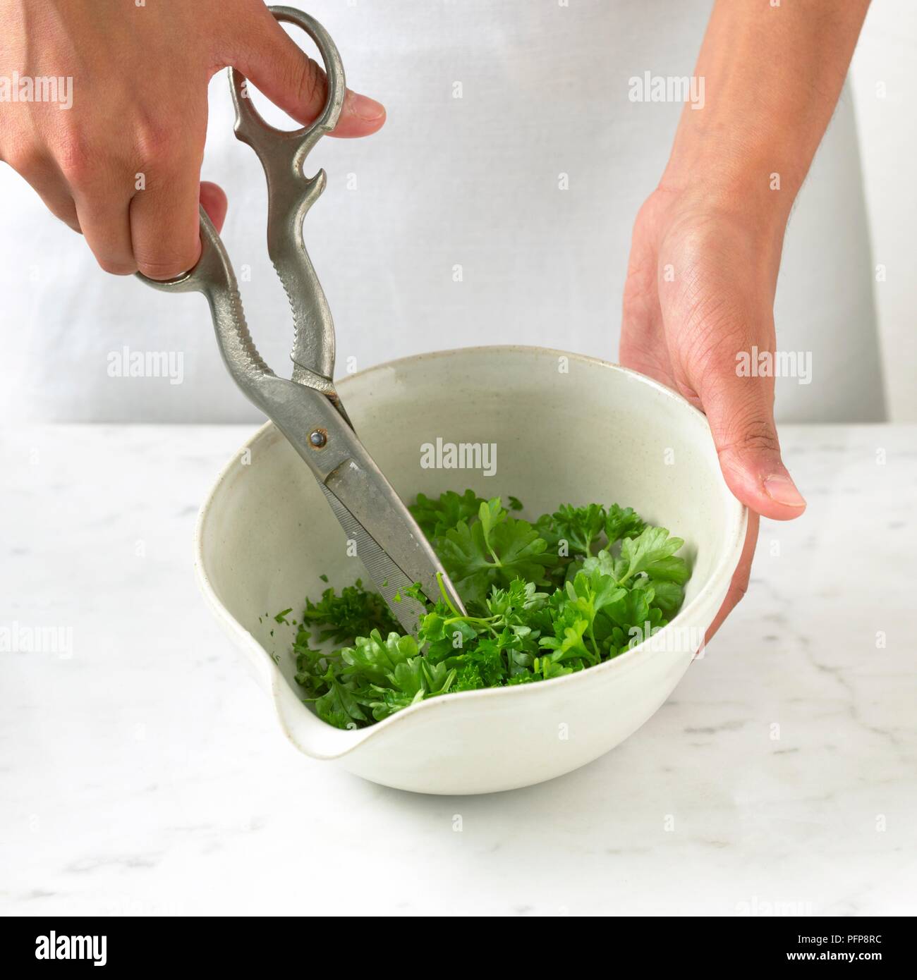 Image human hand cutting leaves hi-res stock photography and images - Alamy