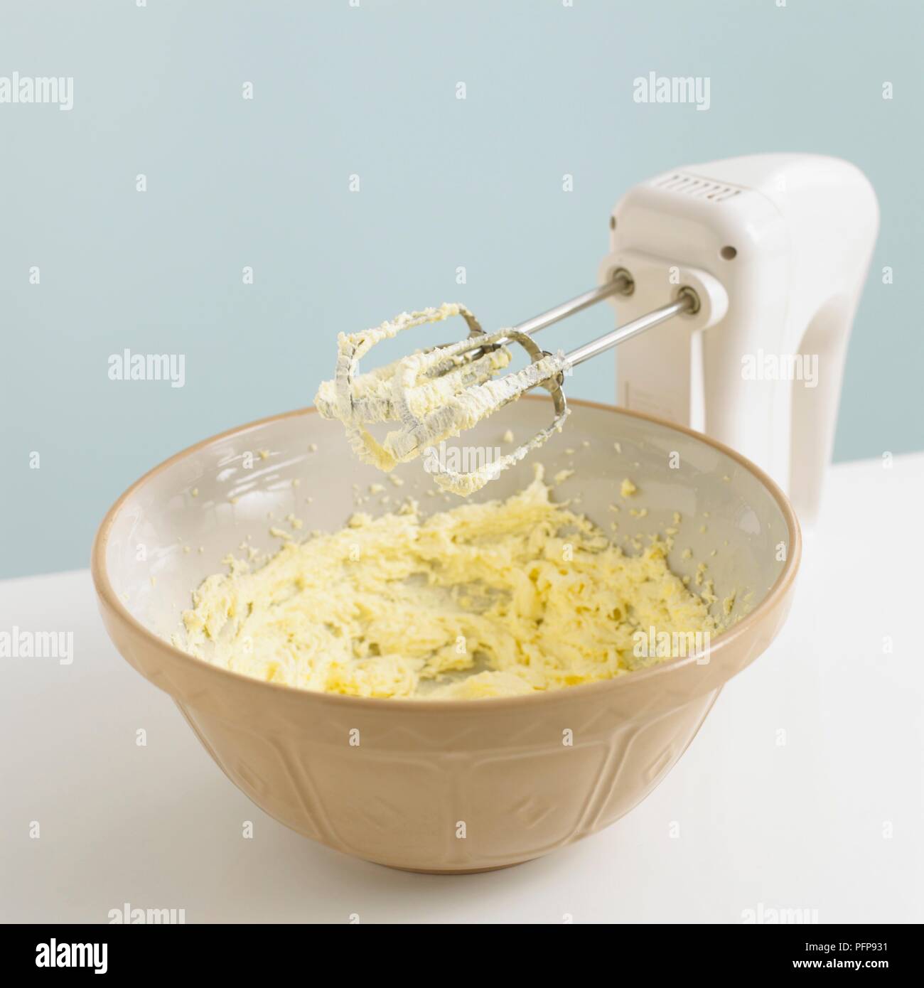 Electric whisk above bowl of whisked butter and flour Stock Photo - Alamy
