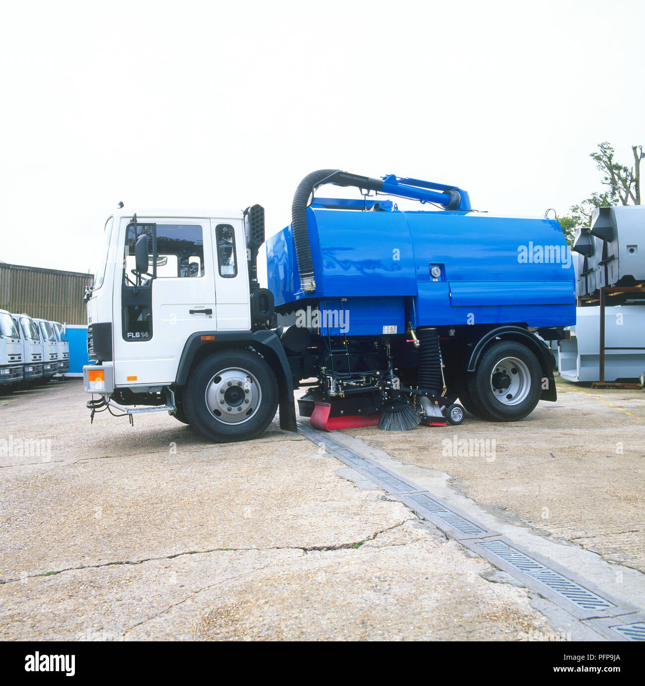 Street sweeper vehicle, side view Stock Photo - Alamy