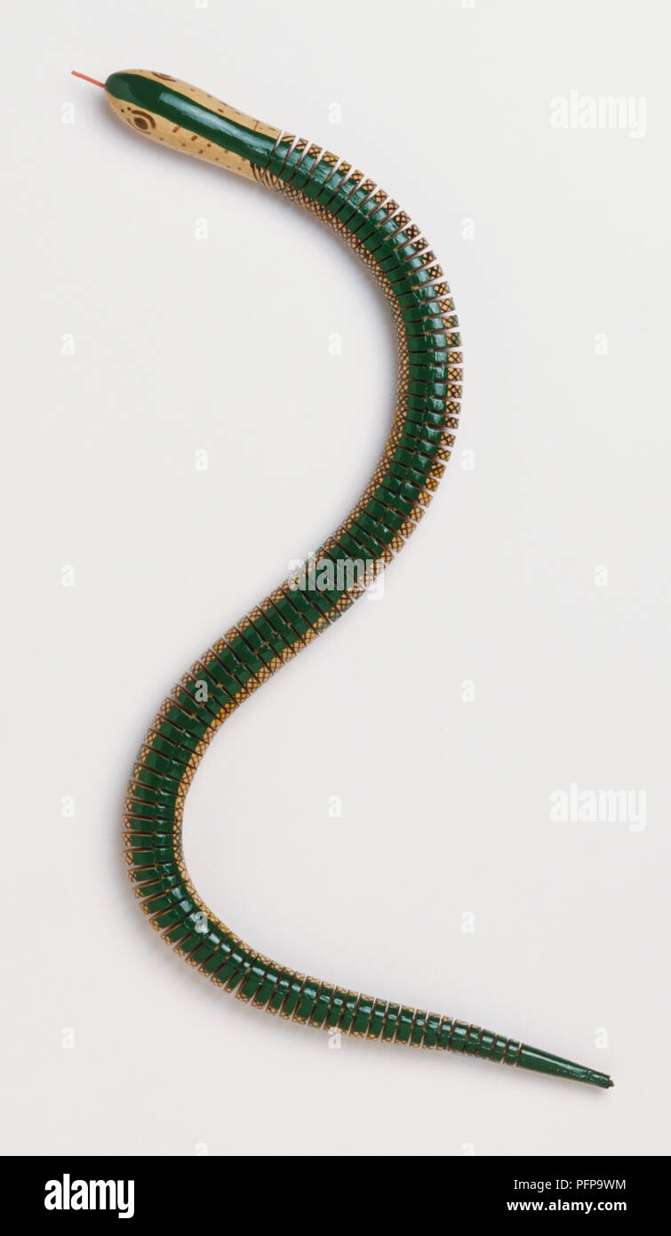 Green toy snake, view from above Stock Photo - Alamy