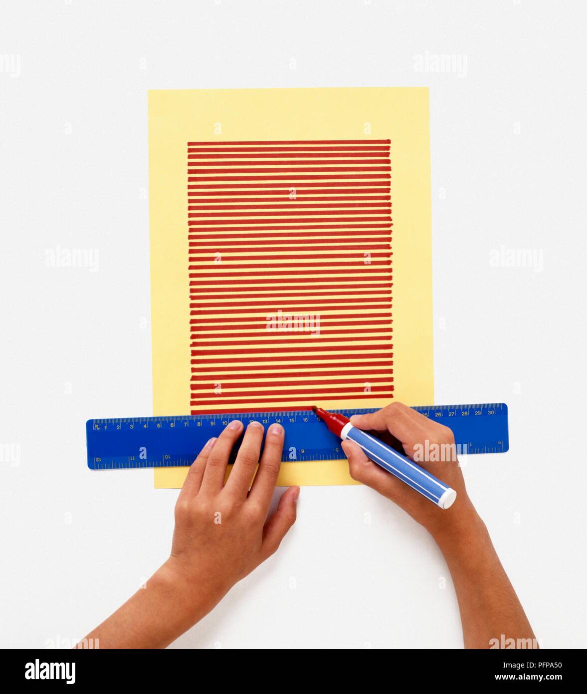 Child using ruler hi-res stock photography and images - Alamy