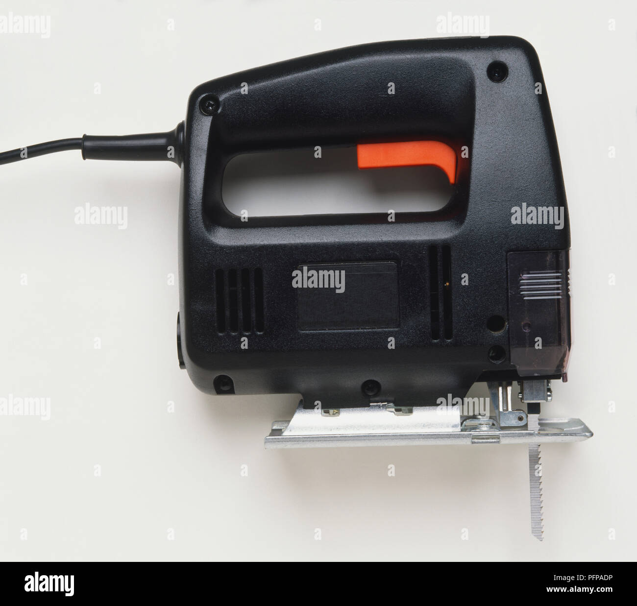 Profile of black jigsaw saw Stock Photo - Alamy