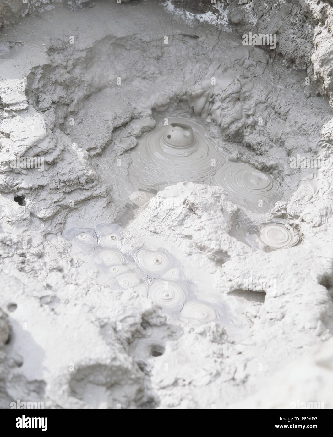 Bubbling mud in a hot spring, view from above Stock Photo - Alamy