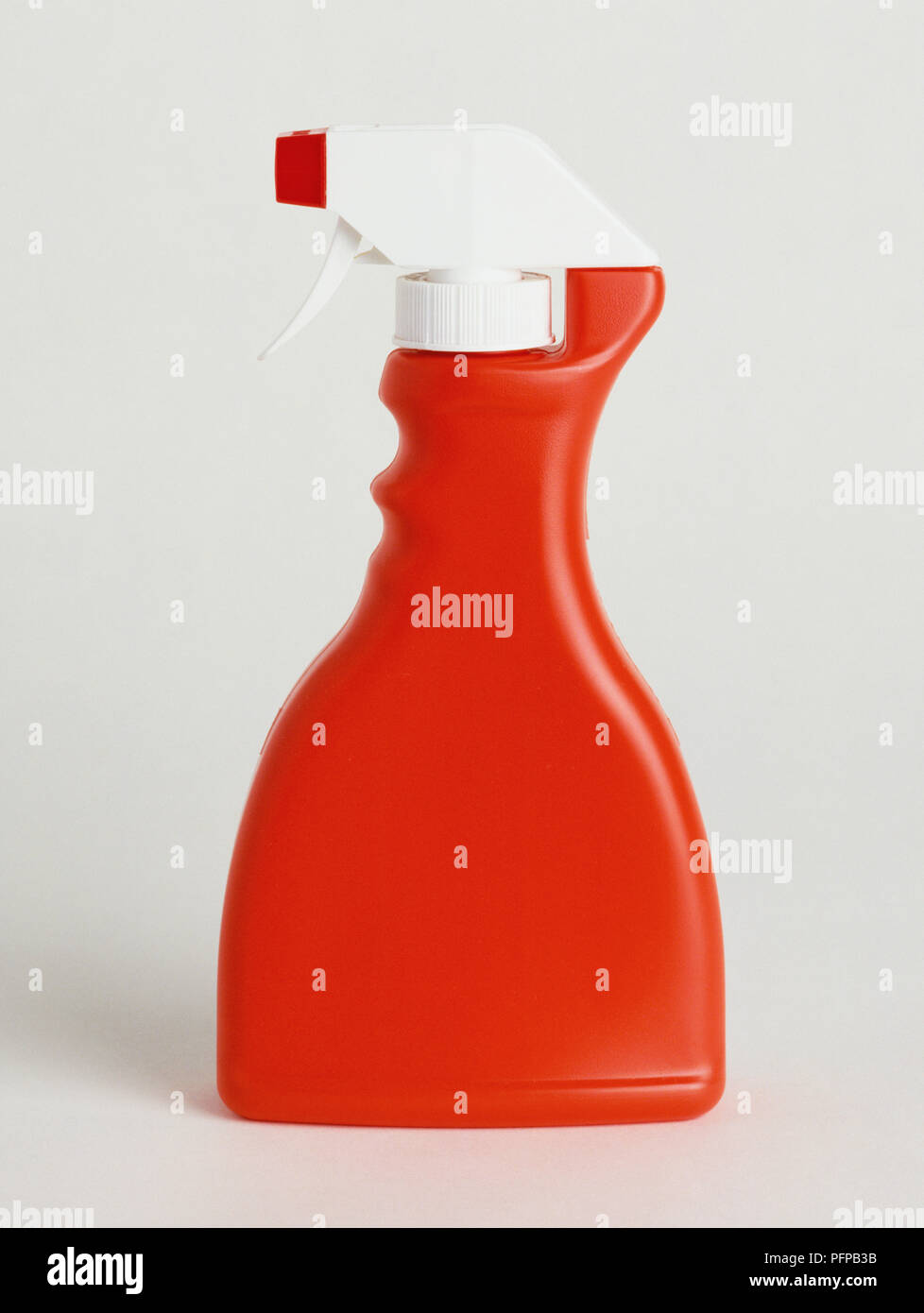 Red spray bottle with white neck Stock Photo - Alamy