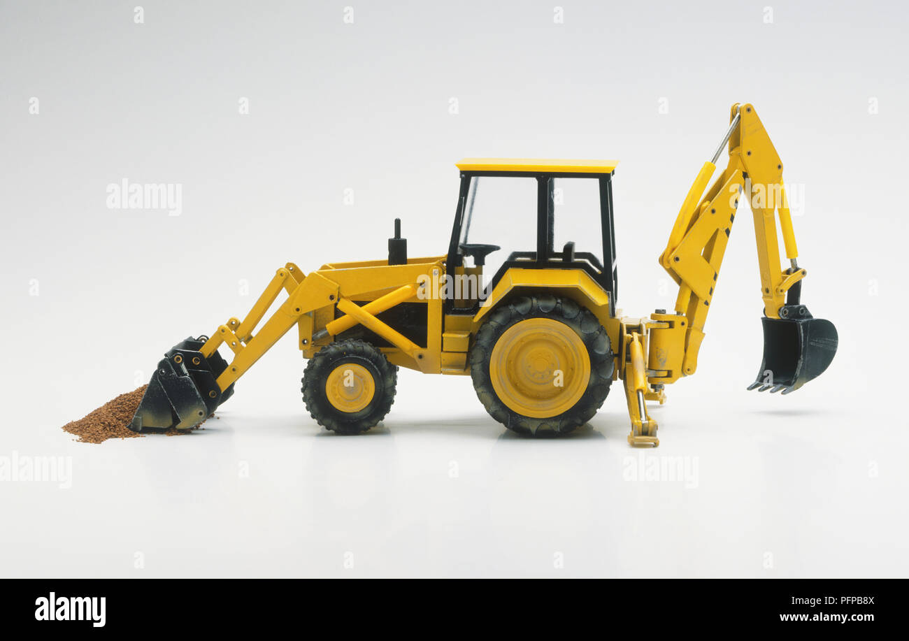 Yellow model digger, side view Stock Photo - Alamy