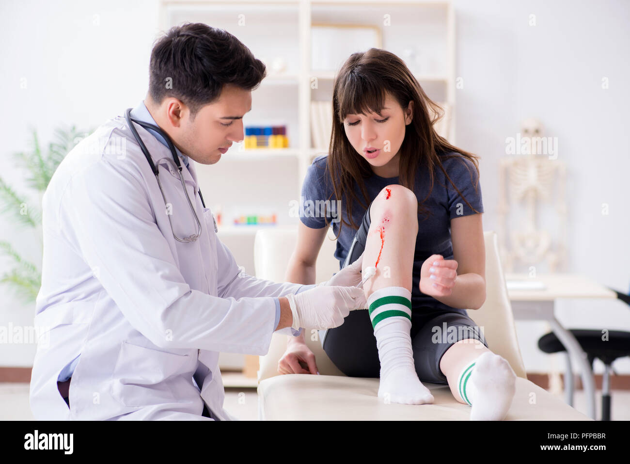 Patient visiting doctor after sustaining sports injury Stock Photo - Alamy