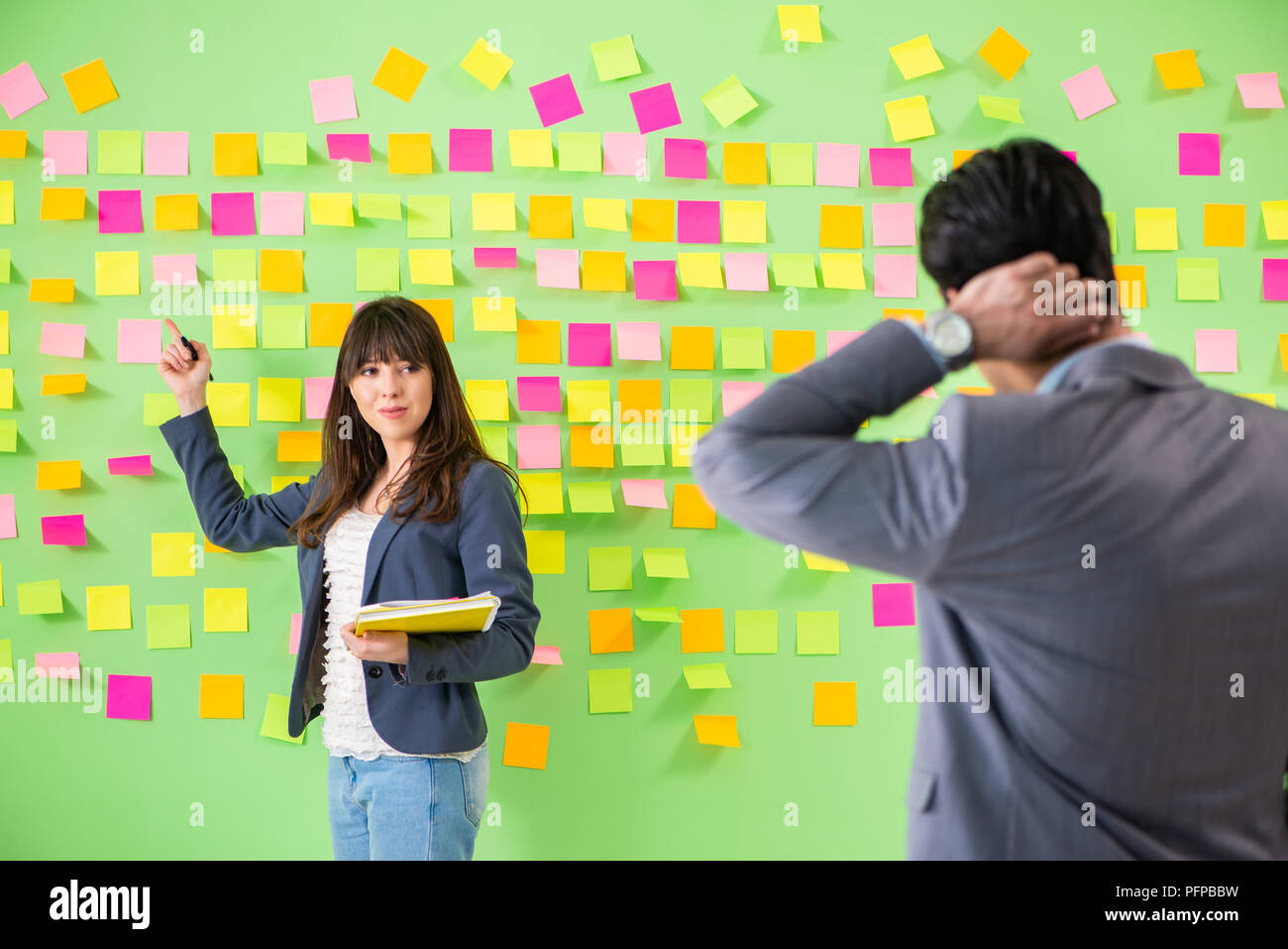 Business colleagues discussing future priorities Stock Photo - Alamy