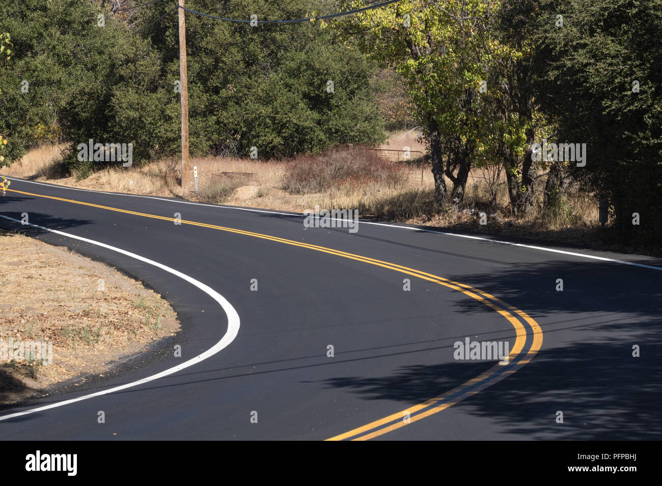 Paved country road hi-res stock photography and images - Alamy