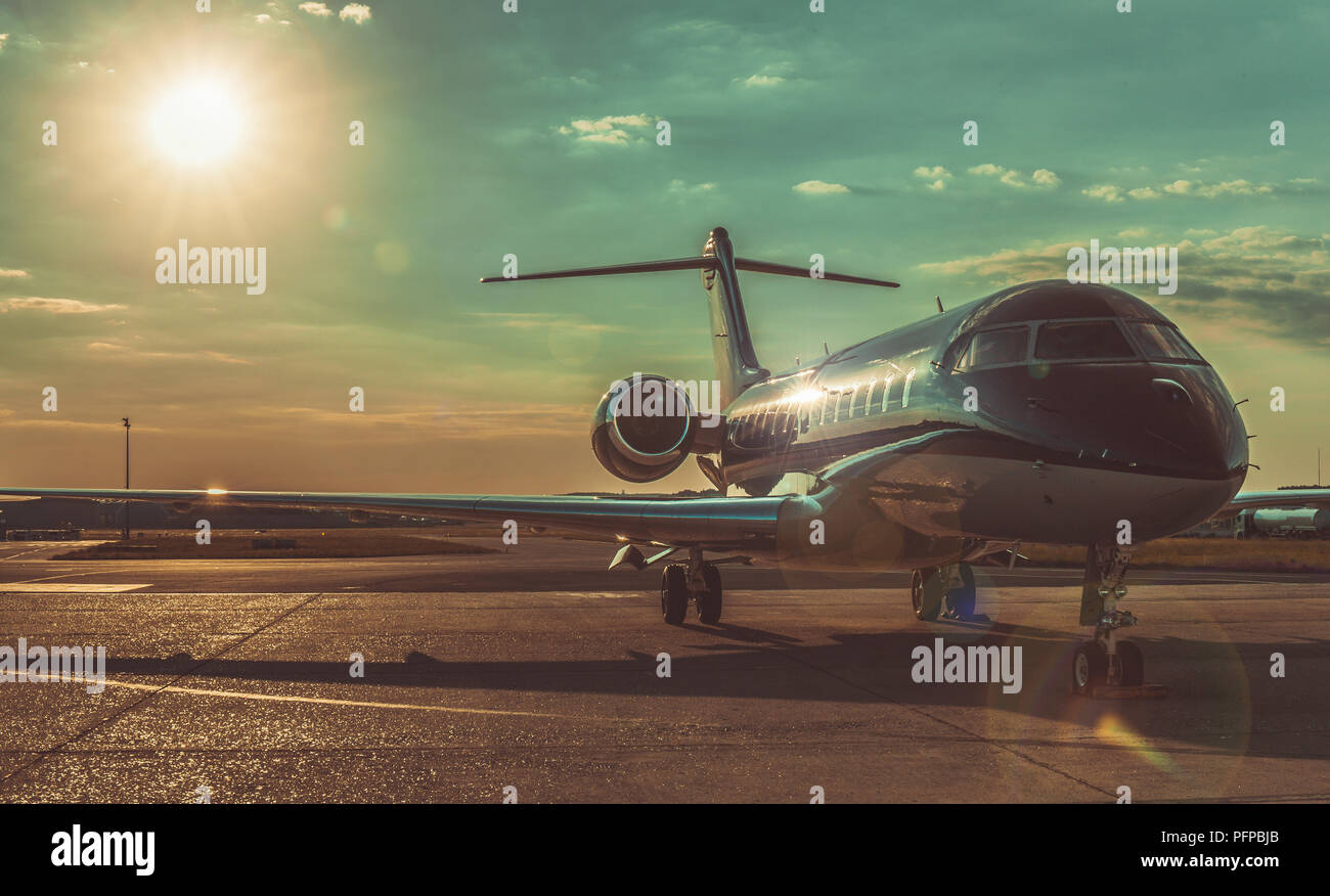 Private Jet at Sunset Stock Photo - Alamy