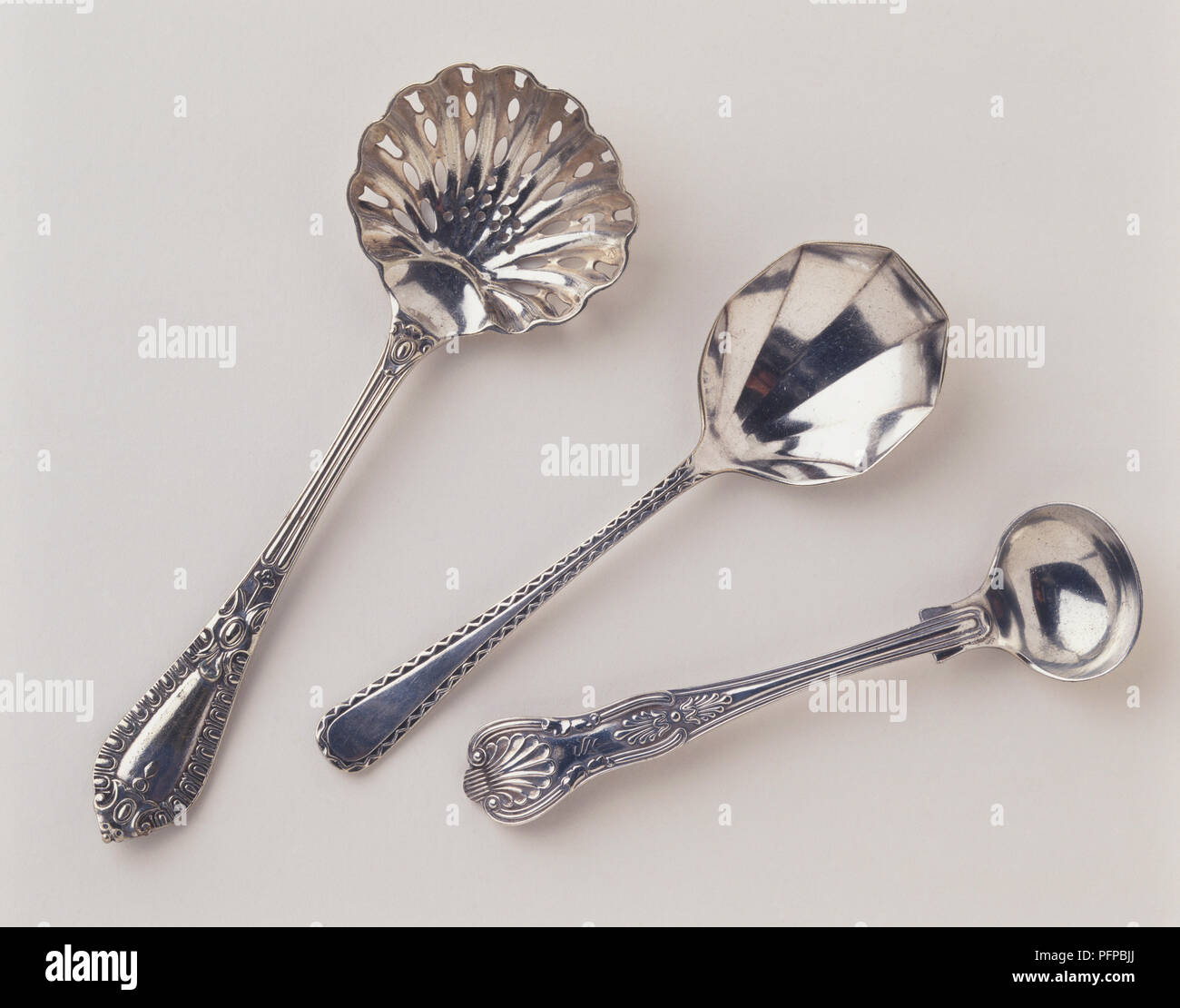 Three decorated silver spoons, close up Stock Photo - Alamy
