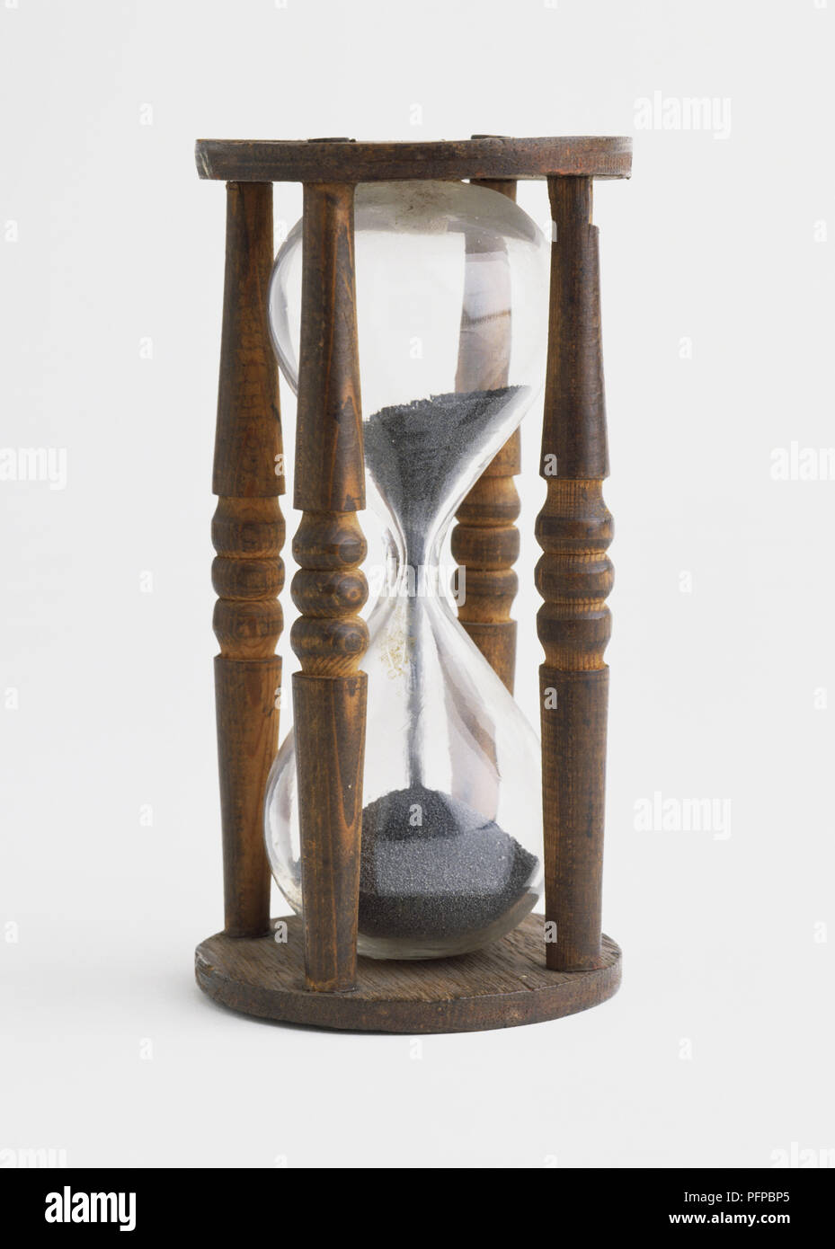 Hourglass in wooden frame hi-res stock photography and images - Alamy