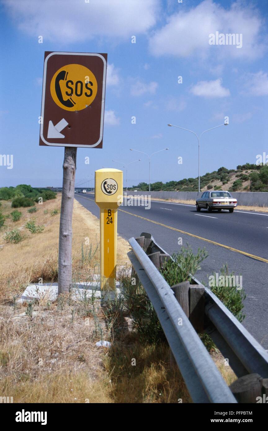 South Africa, car driving near roadside SOS telephone Stock Photo - Alamy