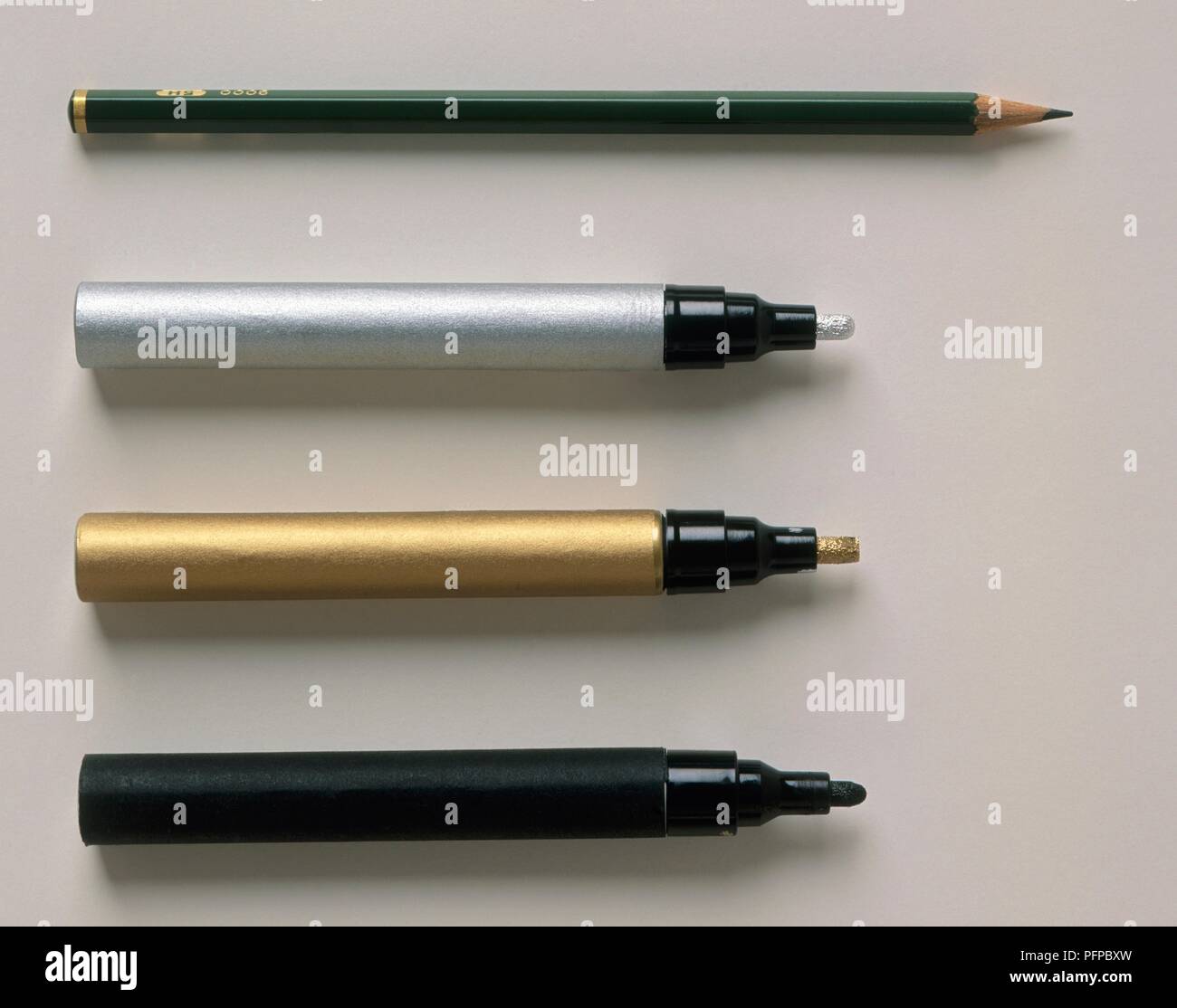 Gold pen pencil hi-res stock photography and images - Alamy