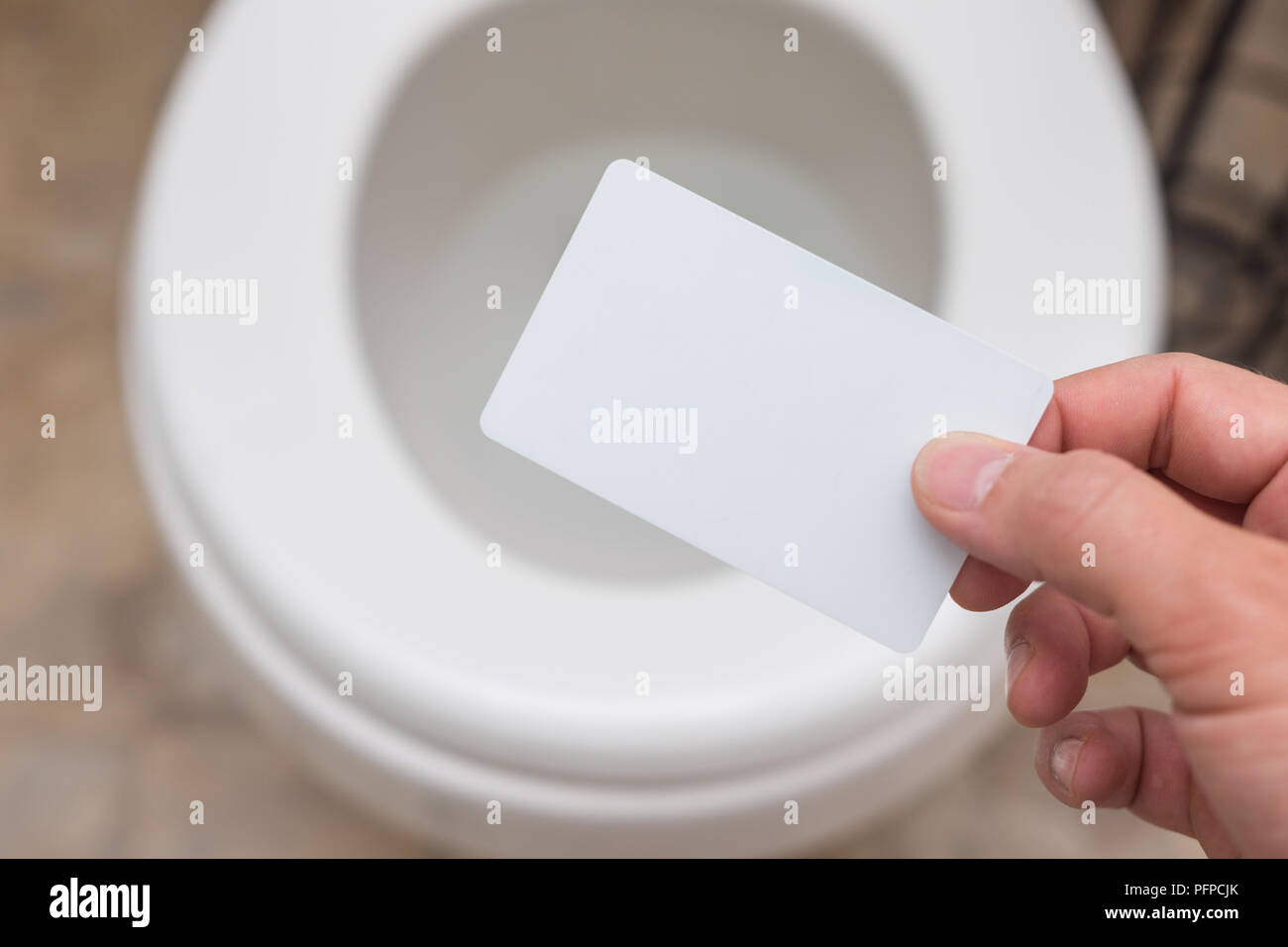 Holding blank card (credit card, membership card, coupon, drivers ...