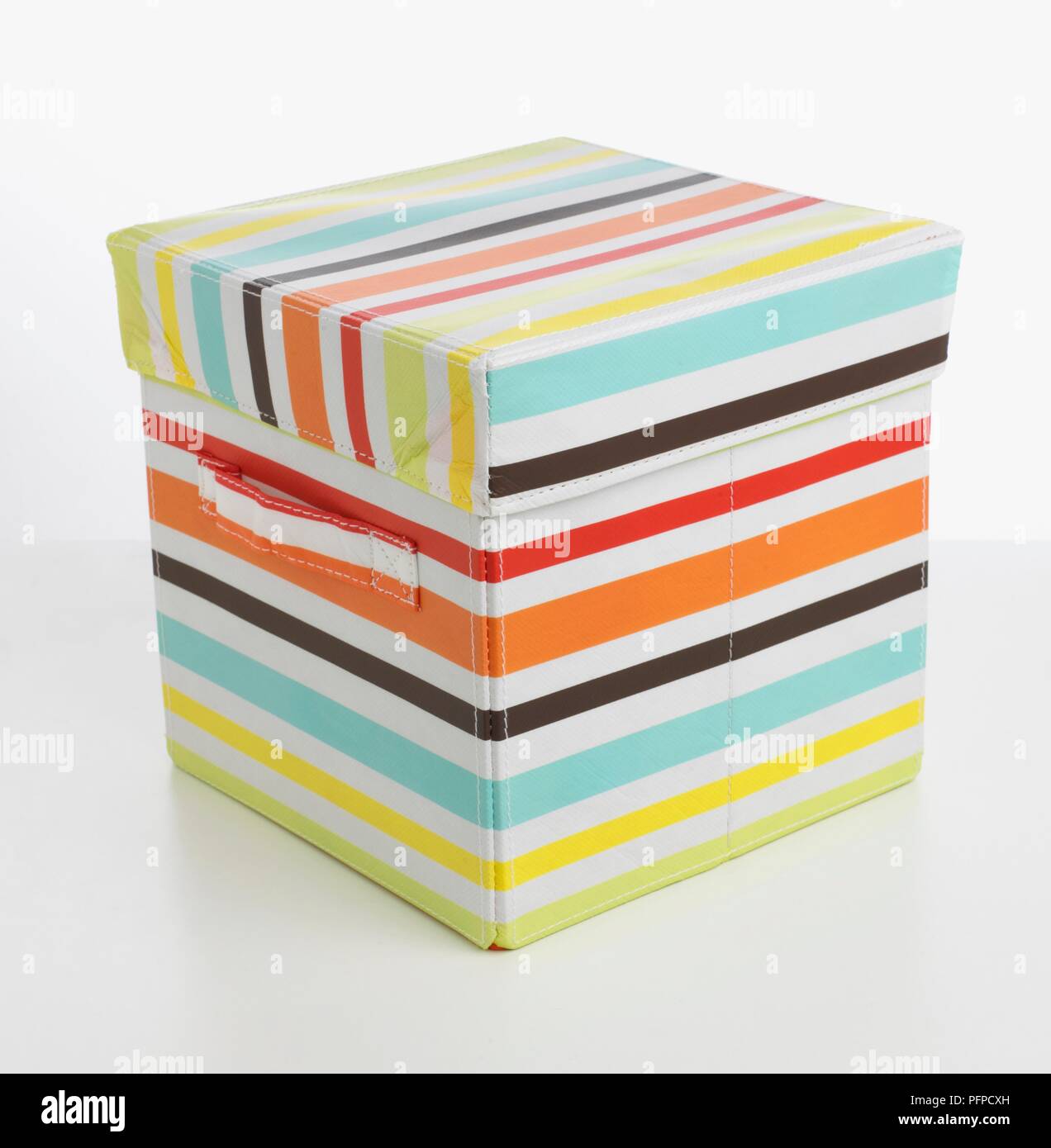 Stripy box with lid, close-up Stock Photo - Alamy