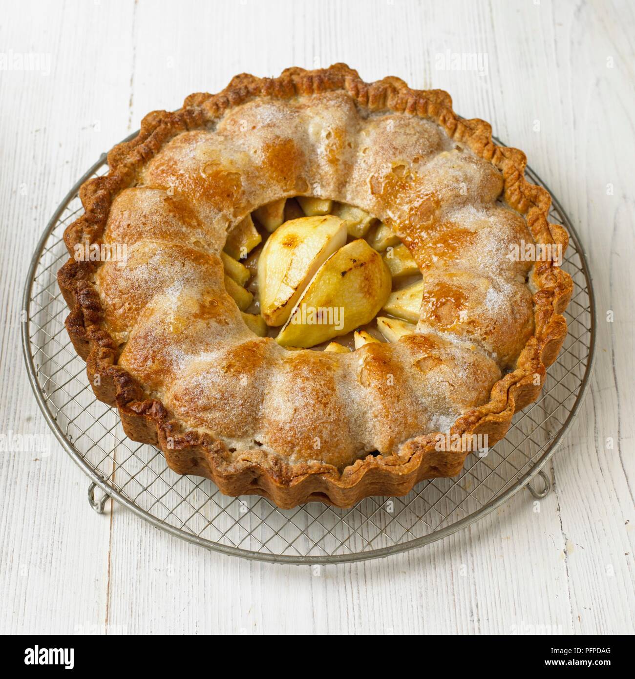 Pear pie on wire rack Stock Photo - Alamy