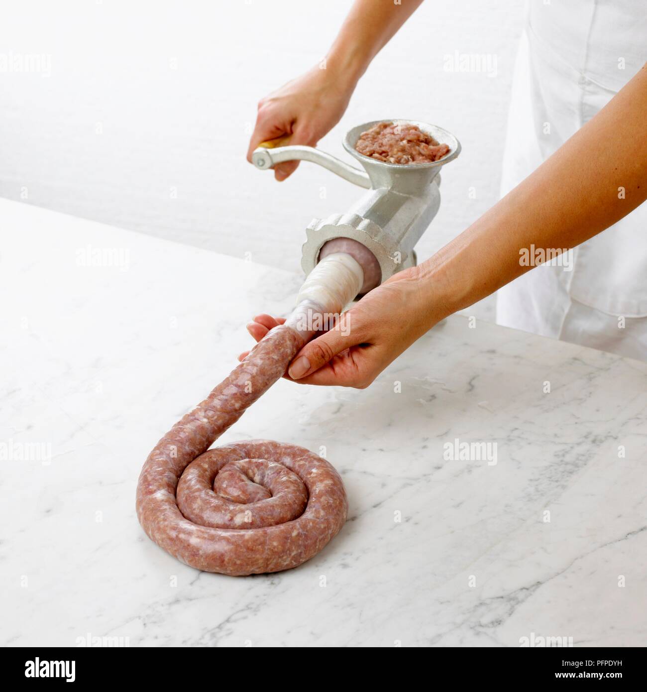 Human meat grinder hi-res stock photography and images - Alamy
