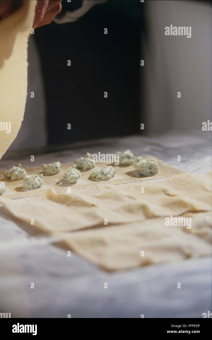 Hand stuffing on sheets pasta hi-res stock photography and images - Alamy