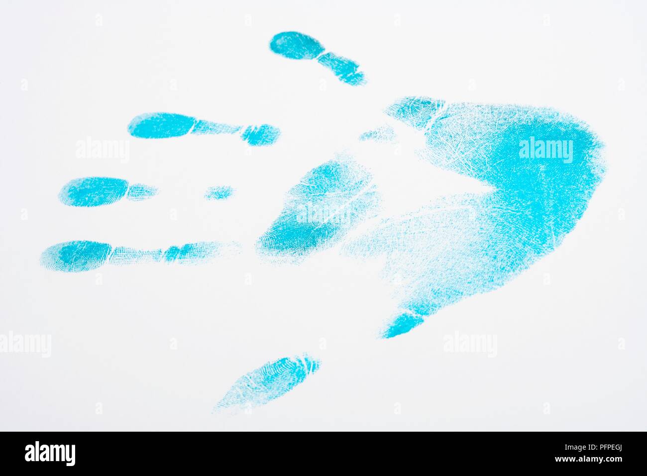 Blue handprint on white background Stock Photo - Alamy