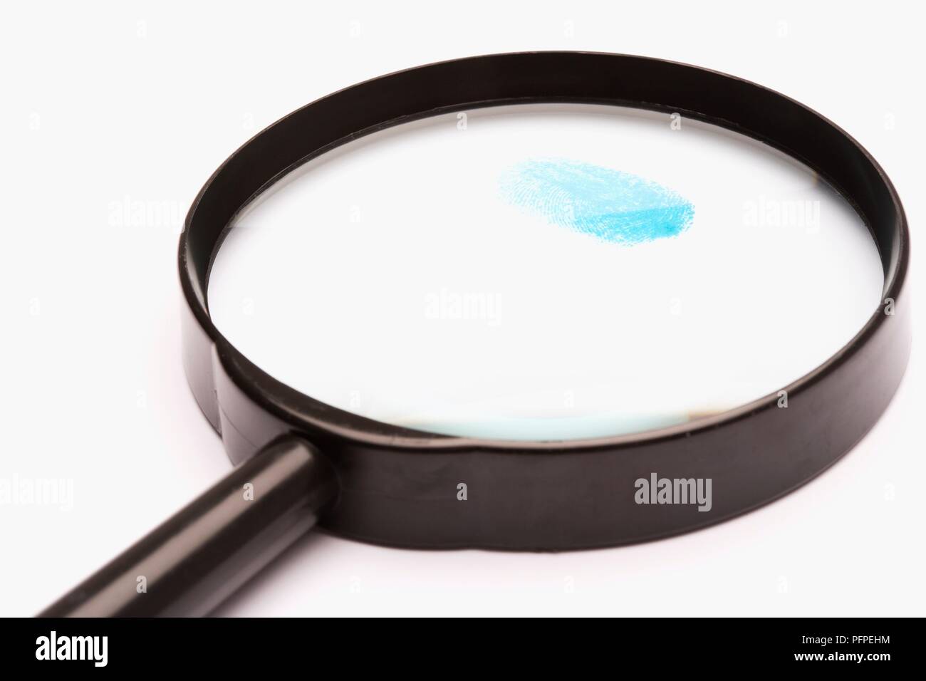 Magnifying glass over fingerprint hi-res stock photography and images ...