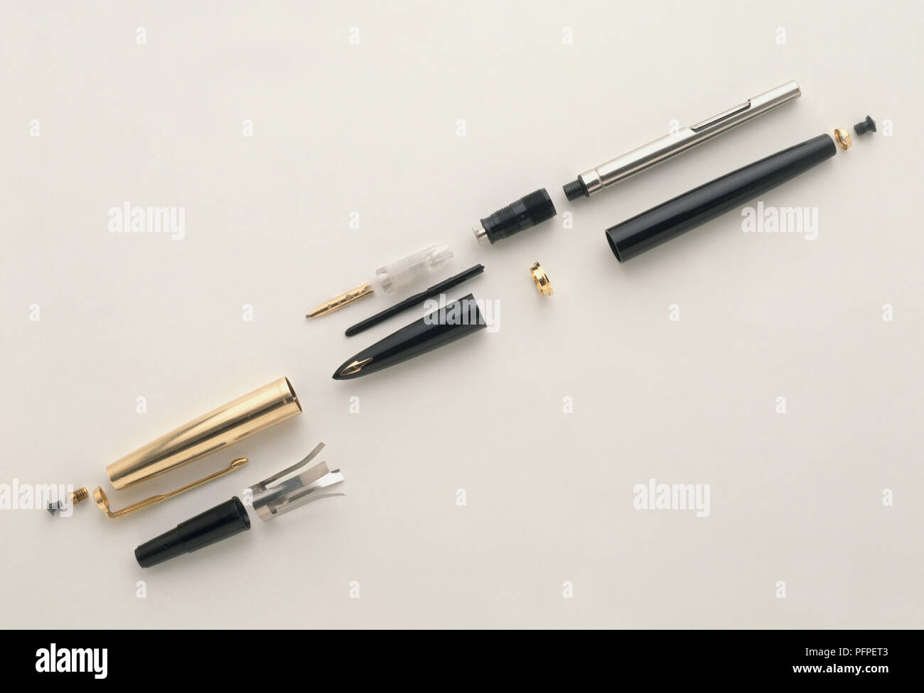 Separated parts of fountain pen Stock Photo - Alamy