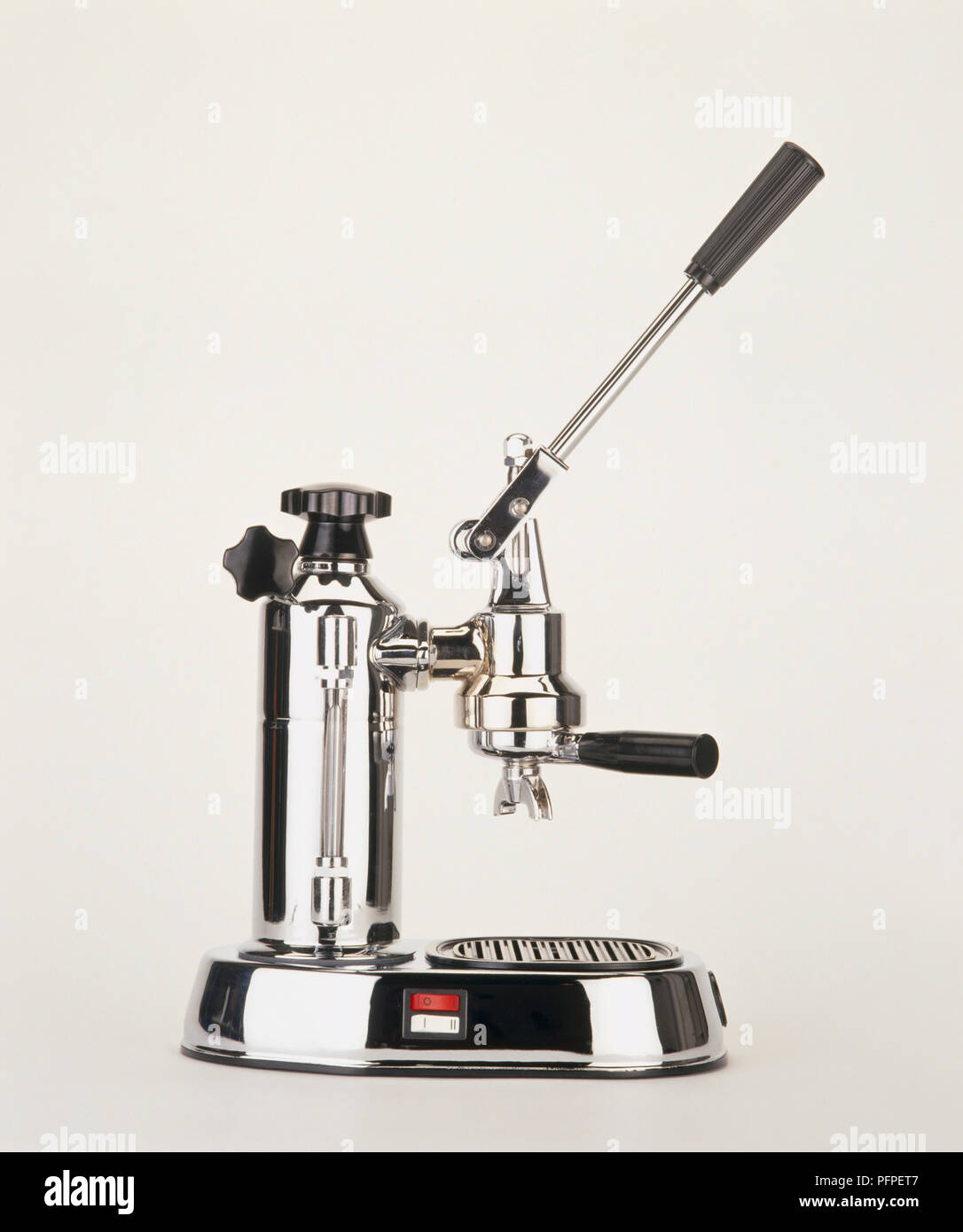 Shiny metallic espresso machine Stock Photo - Alamy