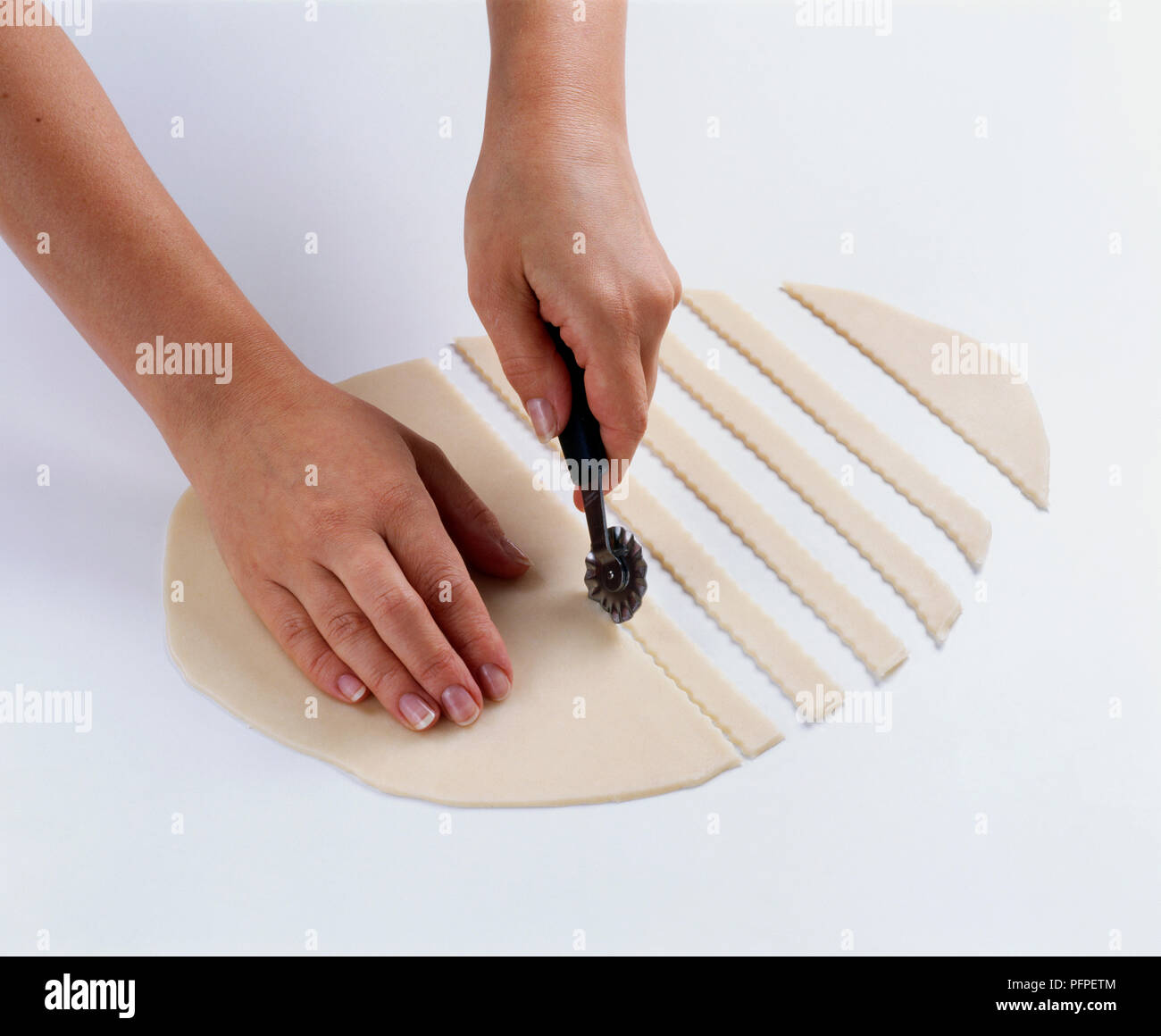 Wheel pastry cutter hi-res stock photography and images - Alamy