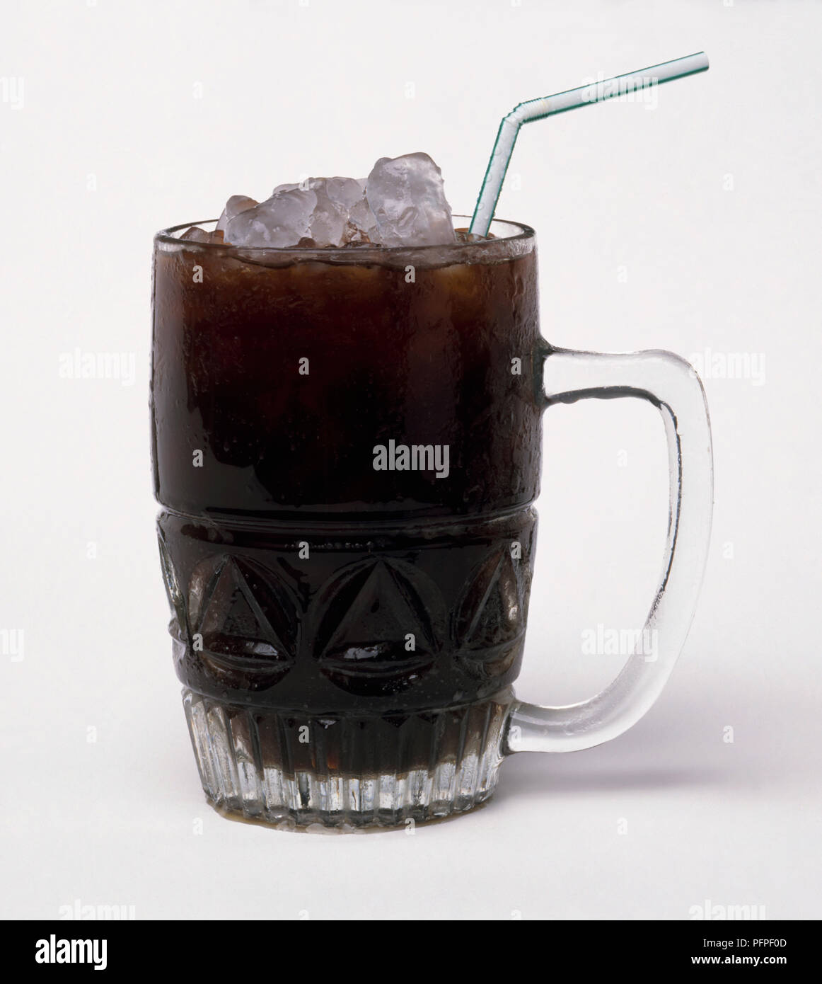 Thailand, Pint of coke with ice and straw Stock Photo - Alamy