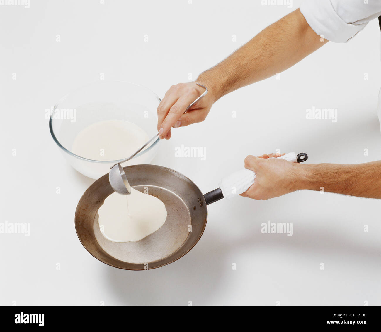 Heated frying pan hi-res stock photography and images - Alamy