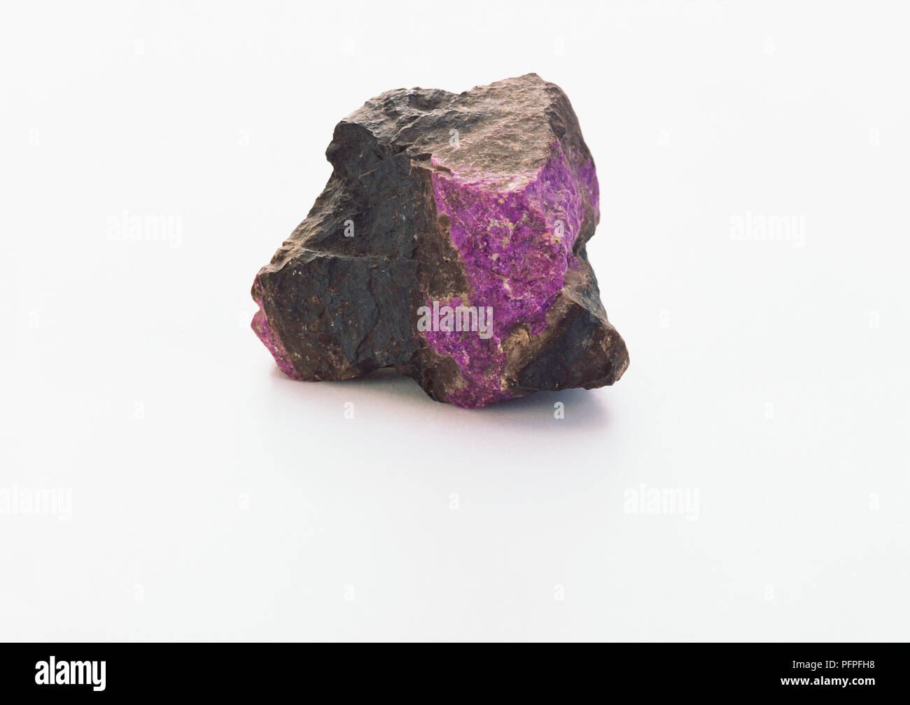 Massive purple sugilite on rock groundmass Stock Photo - Alamy