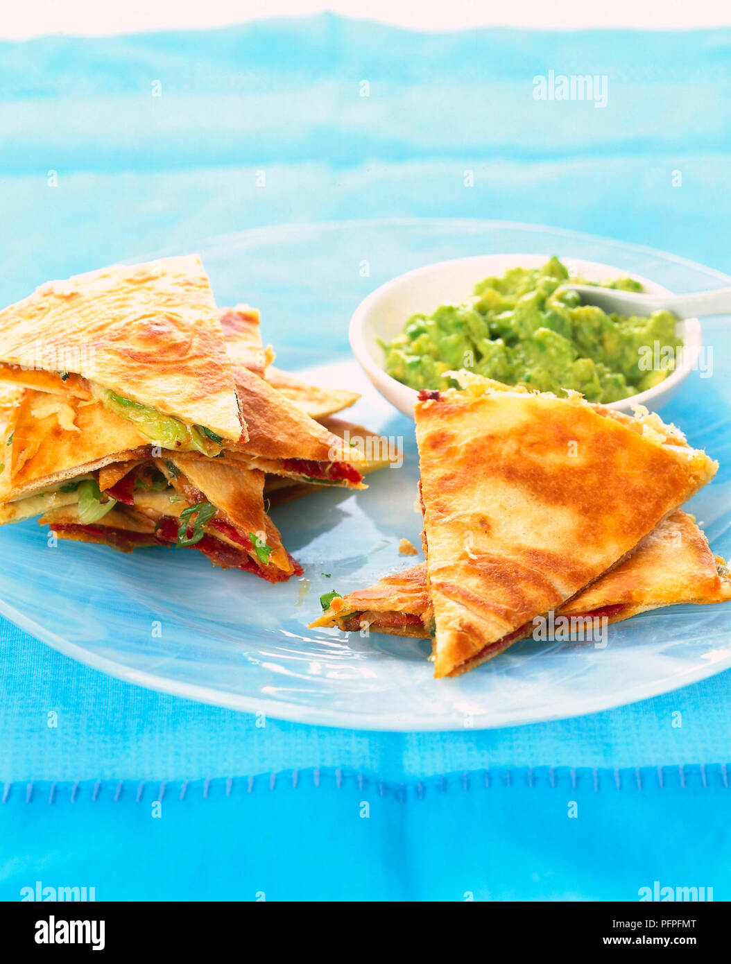 Crispy chorizo quesadillas with guacamole Stock Photo - Alamy