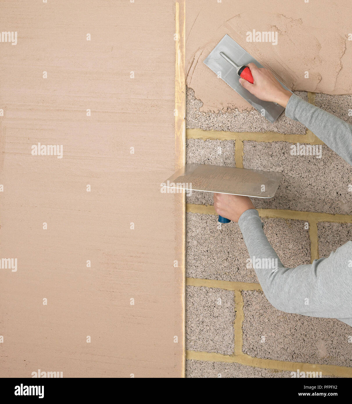 Man applying brick hi-res stock photography and images - Alamy