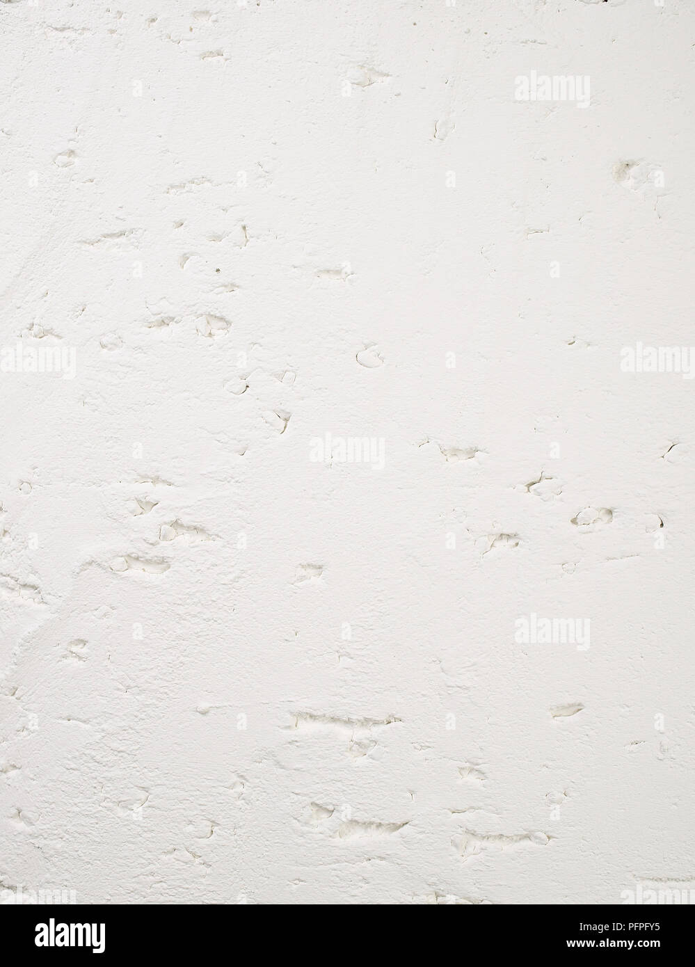 Patterned render on wall Stock Photo - Alamy