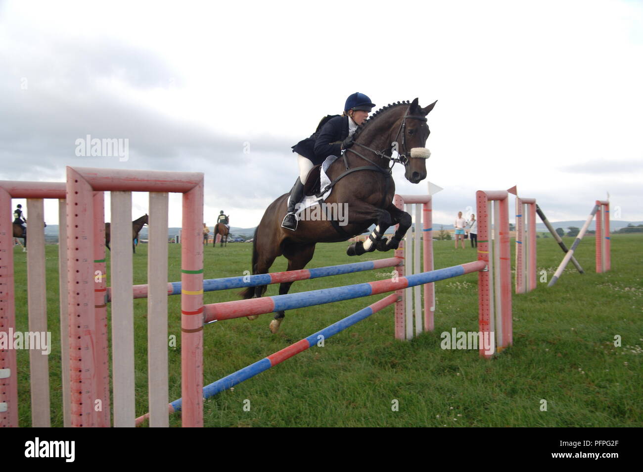 Adult jumping over fence hi-res stock photography and images - Alamy