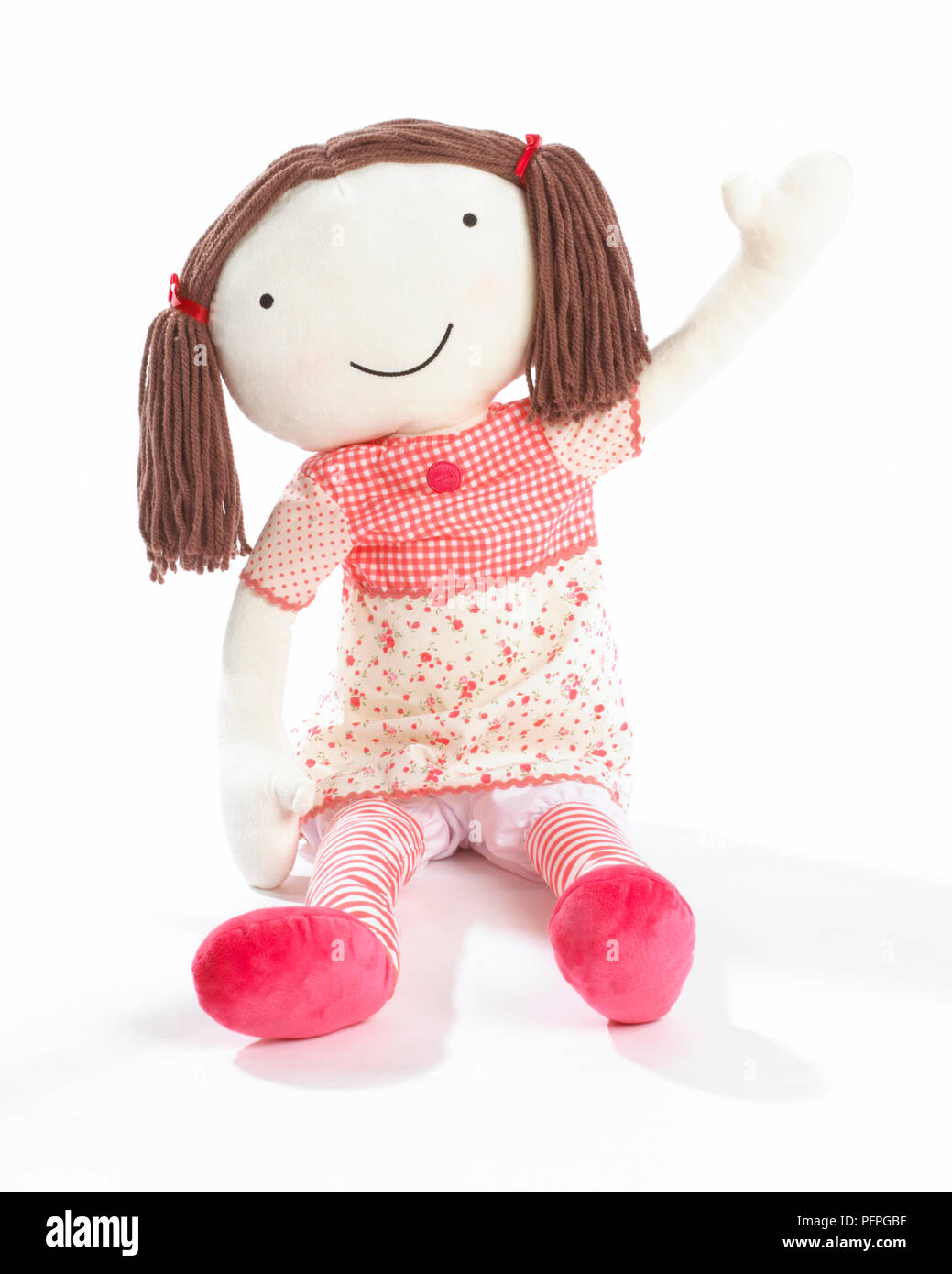 Rag doll with arm up, waving Stock Photo - Alamy
