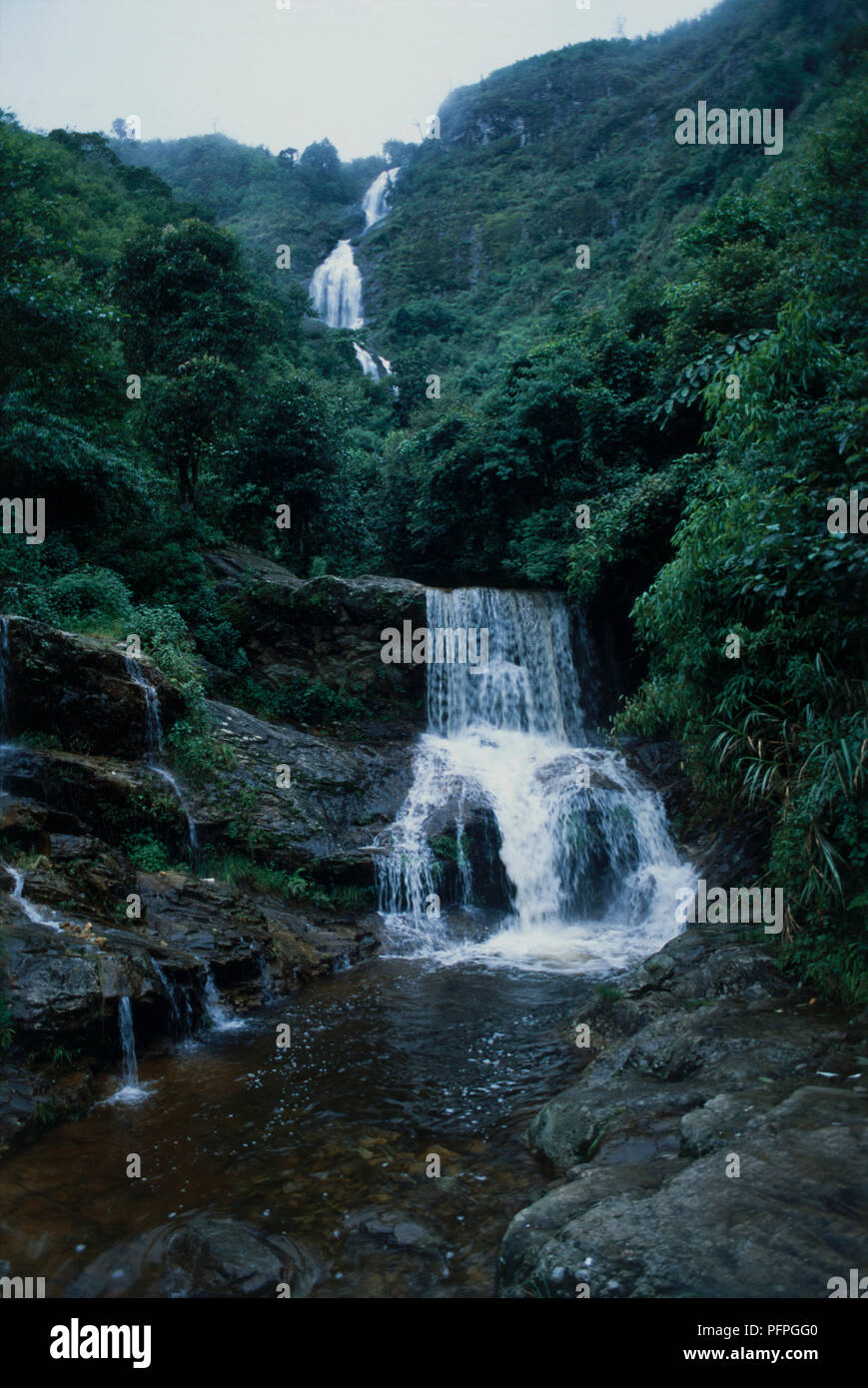 Vietnam, Thac Bac (Silver Waterfall) flowing down moutainside Stock ...