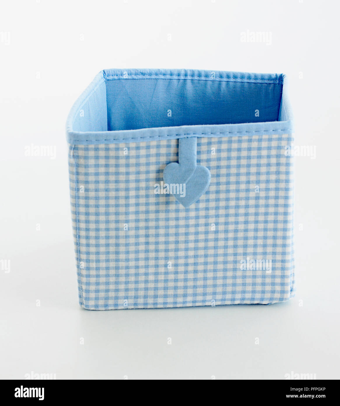 A blue checked box made from fabric Stock Photo - Alamy
