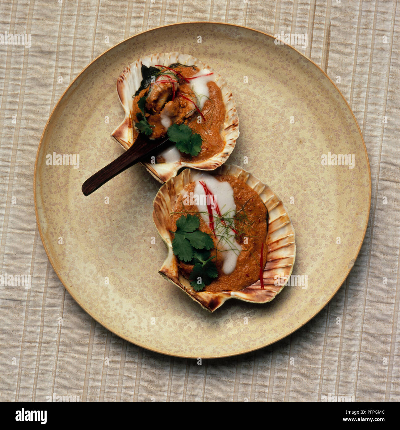 Hor mok hoi shenn, steamed scallop curry from Thailand Stock Photo - Alamy