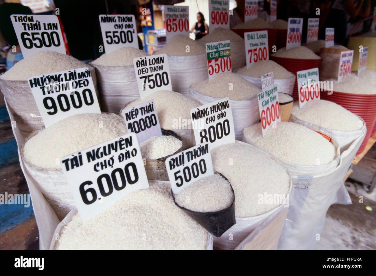 Various types of white rice in sacks at market in Ho Chi Minh City ...