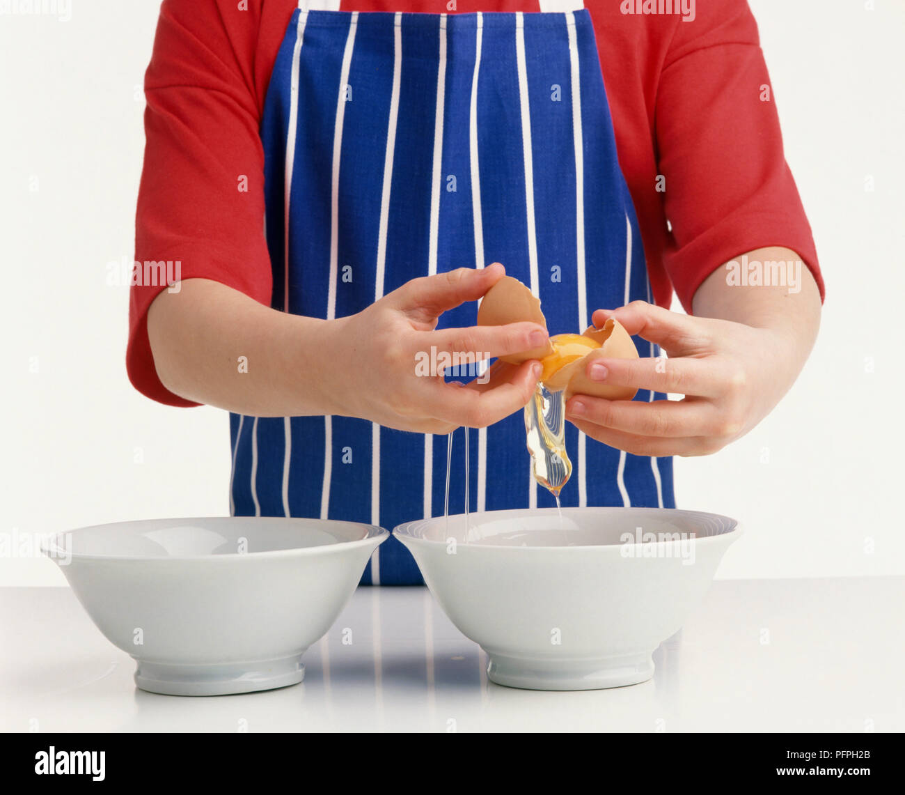 A child breaking an egg hi-res stock photography and images - Alamy